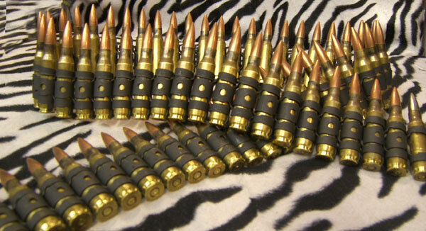 CINTURON DE BALAS DORADAS